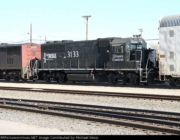 IC GP-40 #3133 is third out on a westbound consist leaving the yard